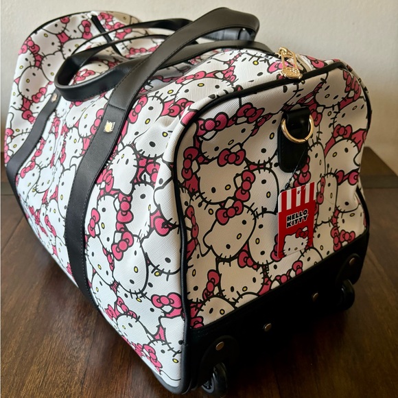 Hello Kitty | Bags | Hello Kitty Rolling Duffle Bag Luggage With Black ...
